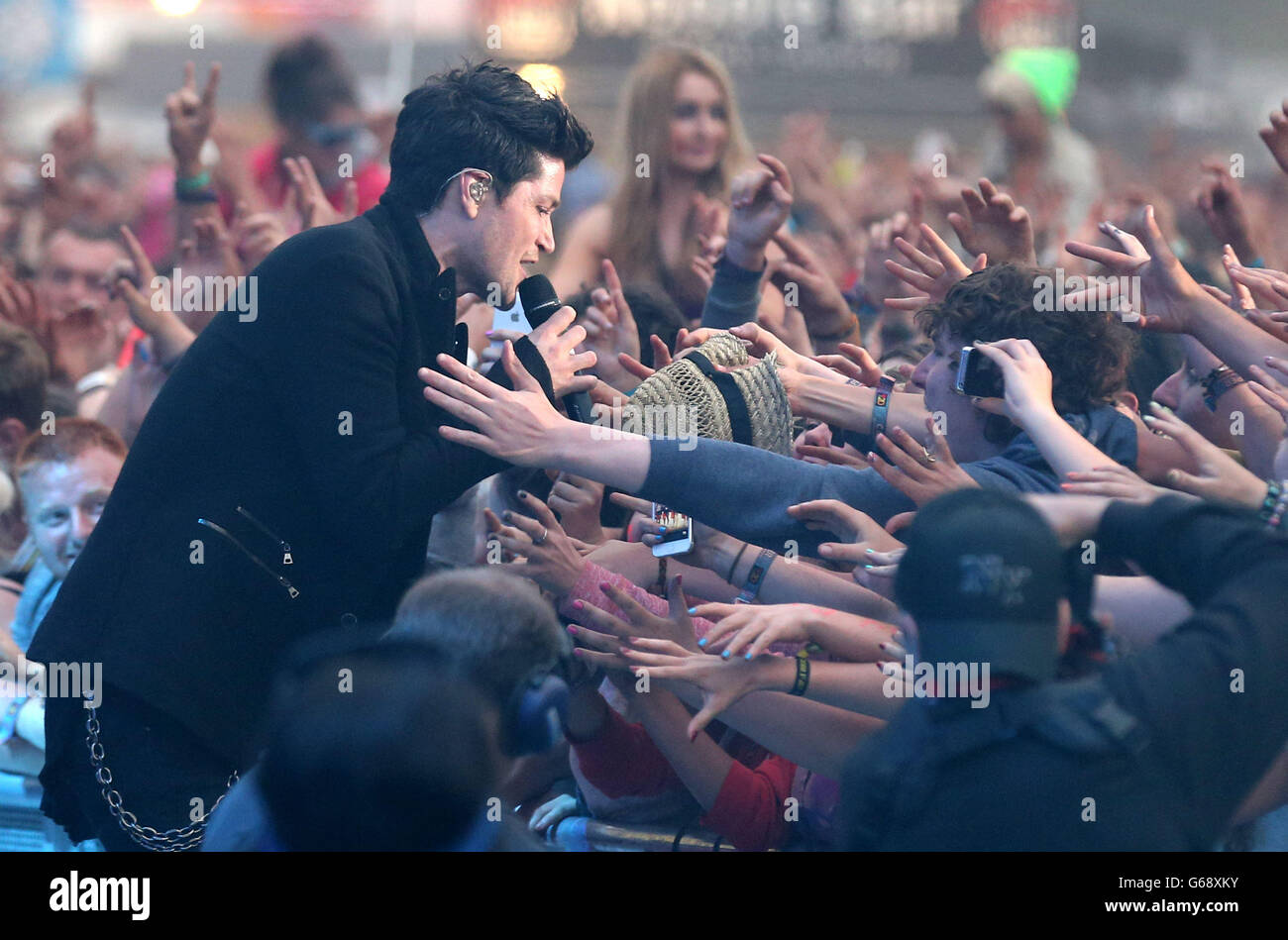 Danny from The Script goes into the crowd at the main stage during the ...