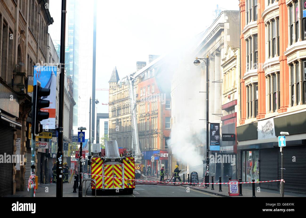 Firefighters scene fire pauls hair world in oldham street hi-res stock ...