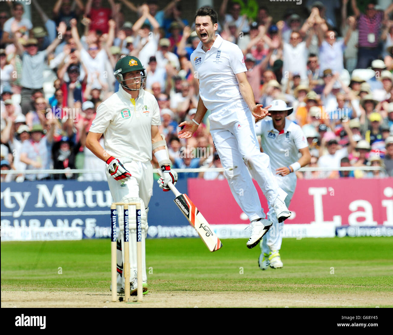 England's James Anderson celebrates after bowling Peter Siddle caught ...