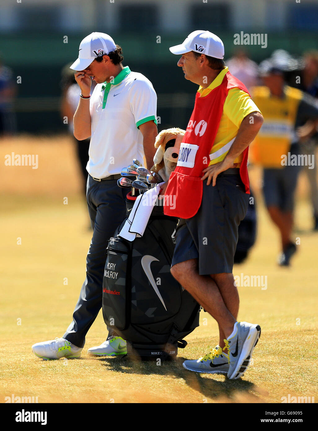 Northern Ireland's Rory McIlroy looks dejected with his caddy JP ...