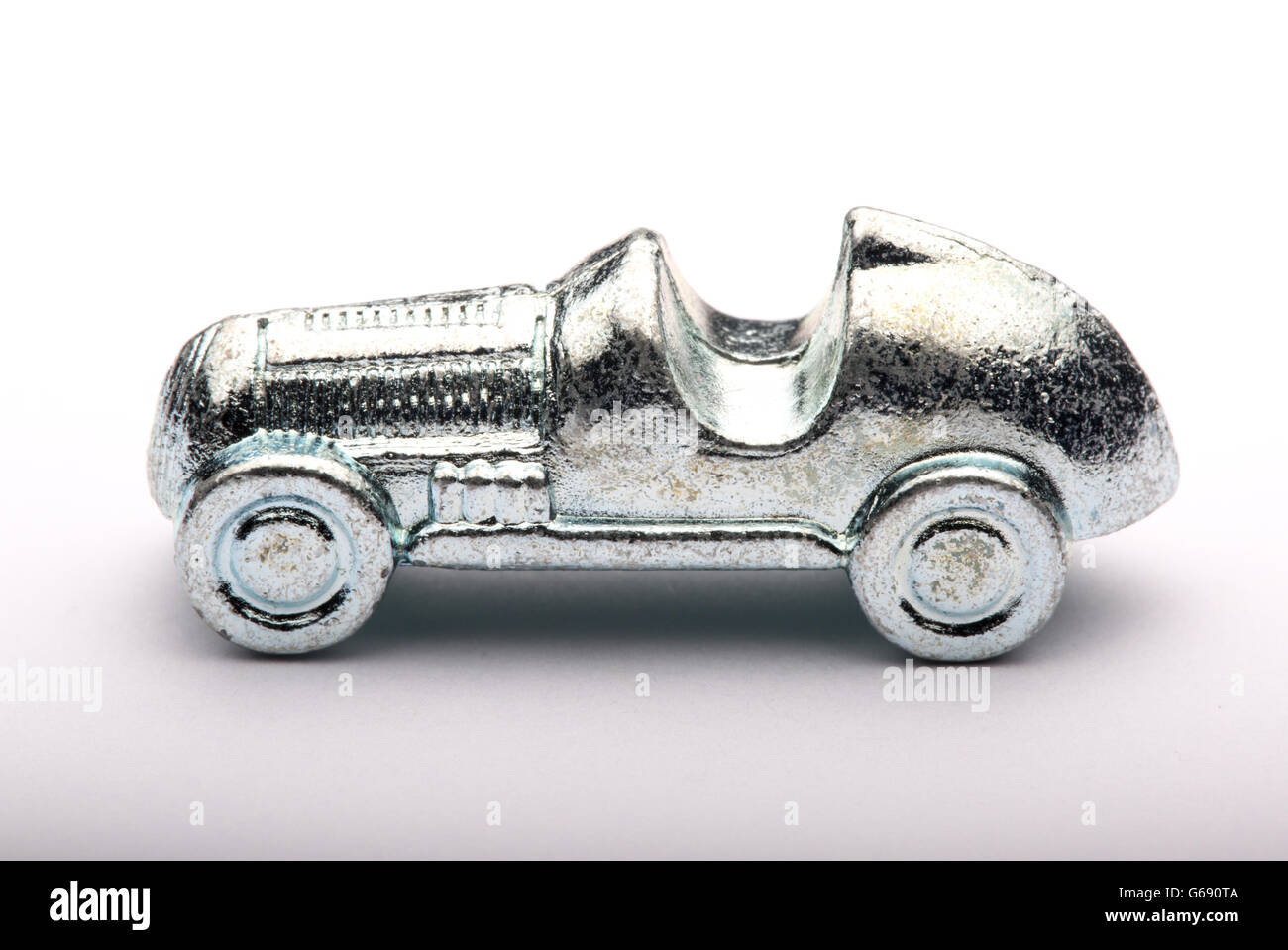 monopoly car piece against a white background Stock Photo - Alamy