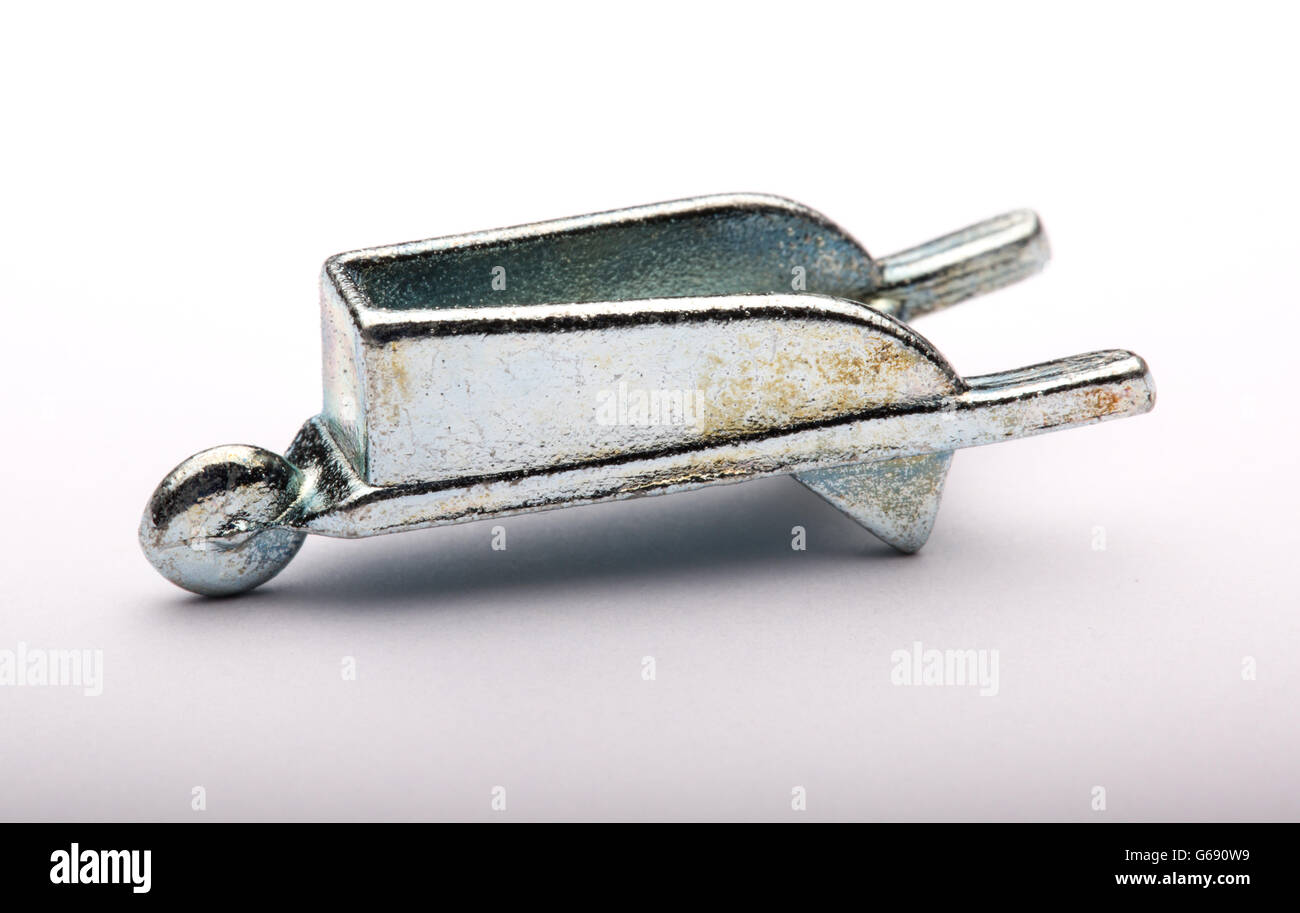 monopoly wheelbarrow piece against a white background Stock Photo - Alamy