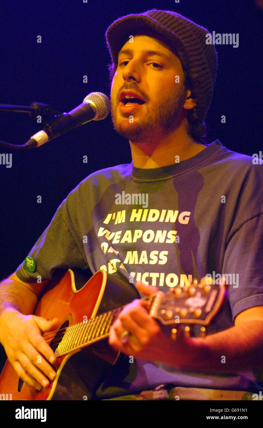 Jamie cato performing on stage one big no anti war concert hi-res stock ...