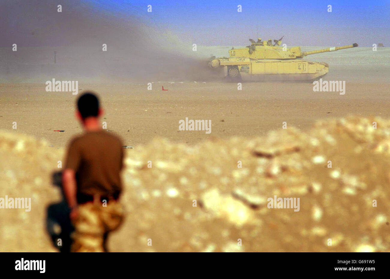 A soldier from the 1st Battalion The Parachute Regiment watches as a ...