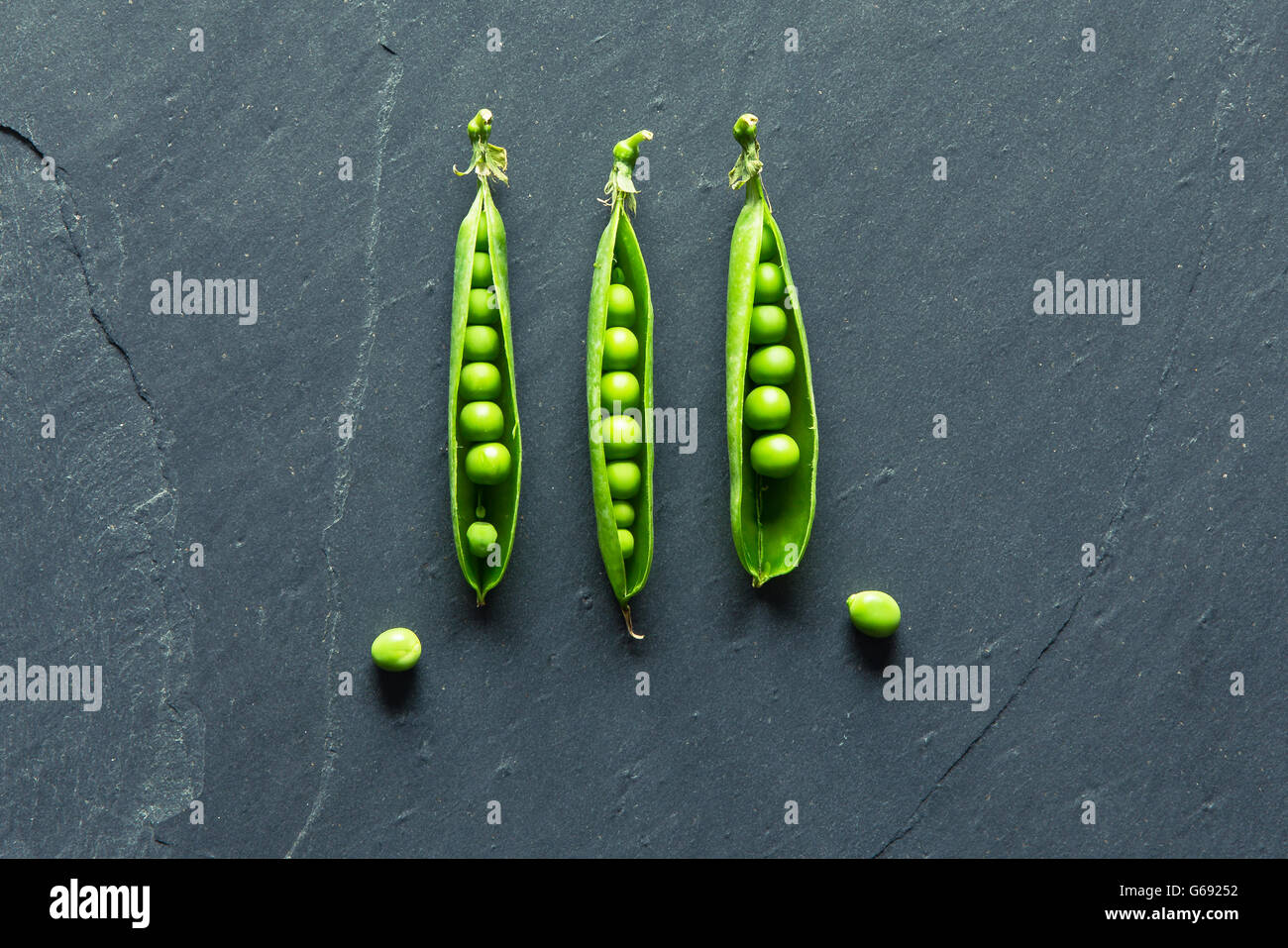 Two pears in a pod Stock Photo - Alamy