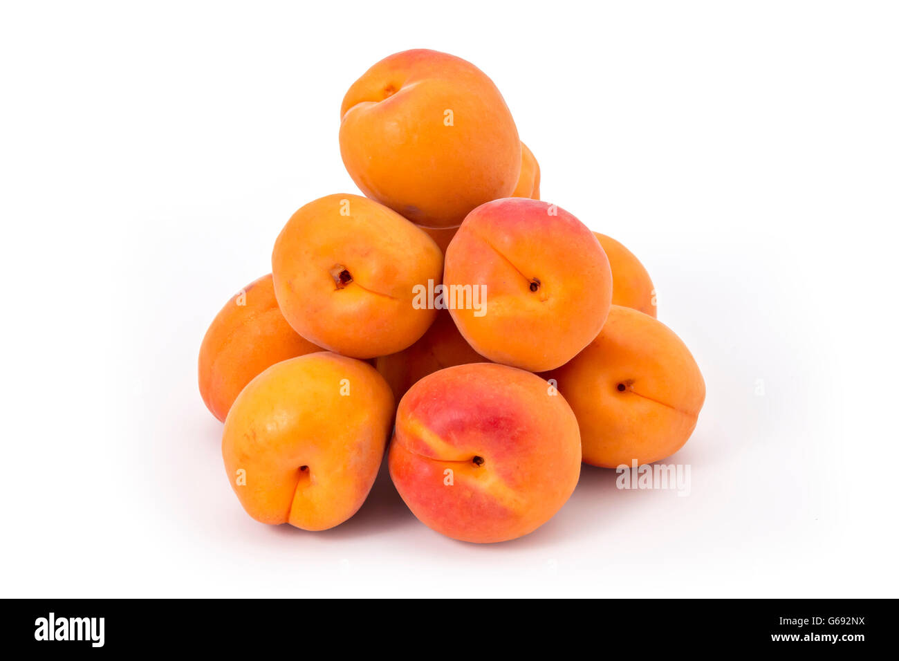 Pile of fresh ripe organic apricots isolated on a white background ...