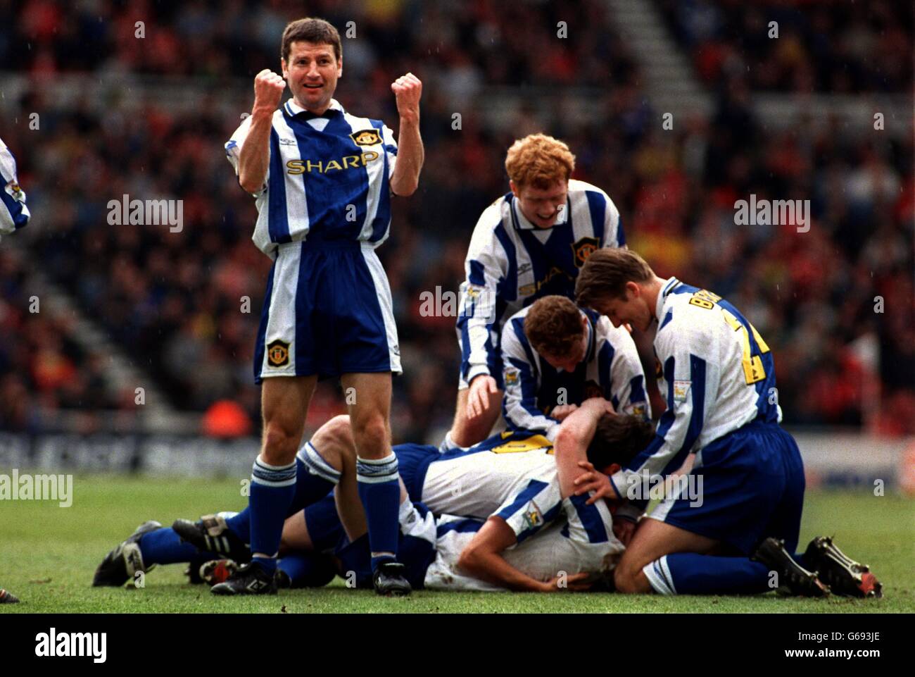 David may is mobbed after scoring manchester uniteds 1st goal hi-res ...