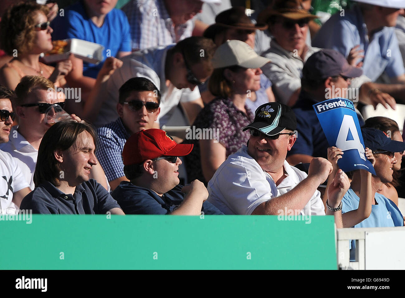 The crowd enjoy the action from the stands at the Kia Oval Stock Photo ...