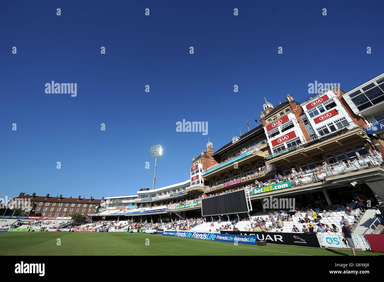 The crowd enjoy the action in the stands at the Kia Oval Stock Photo ...