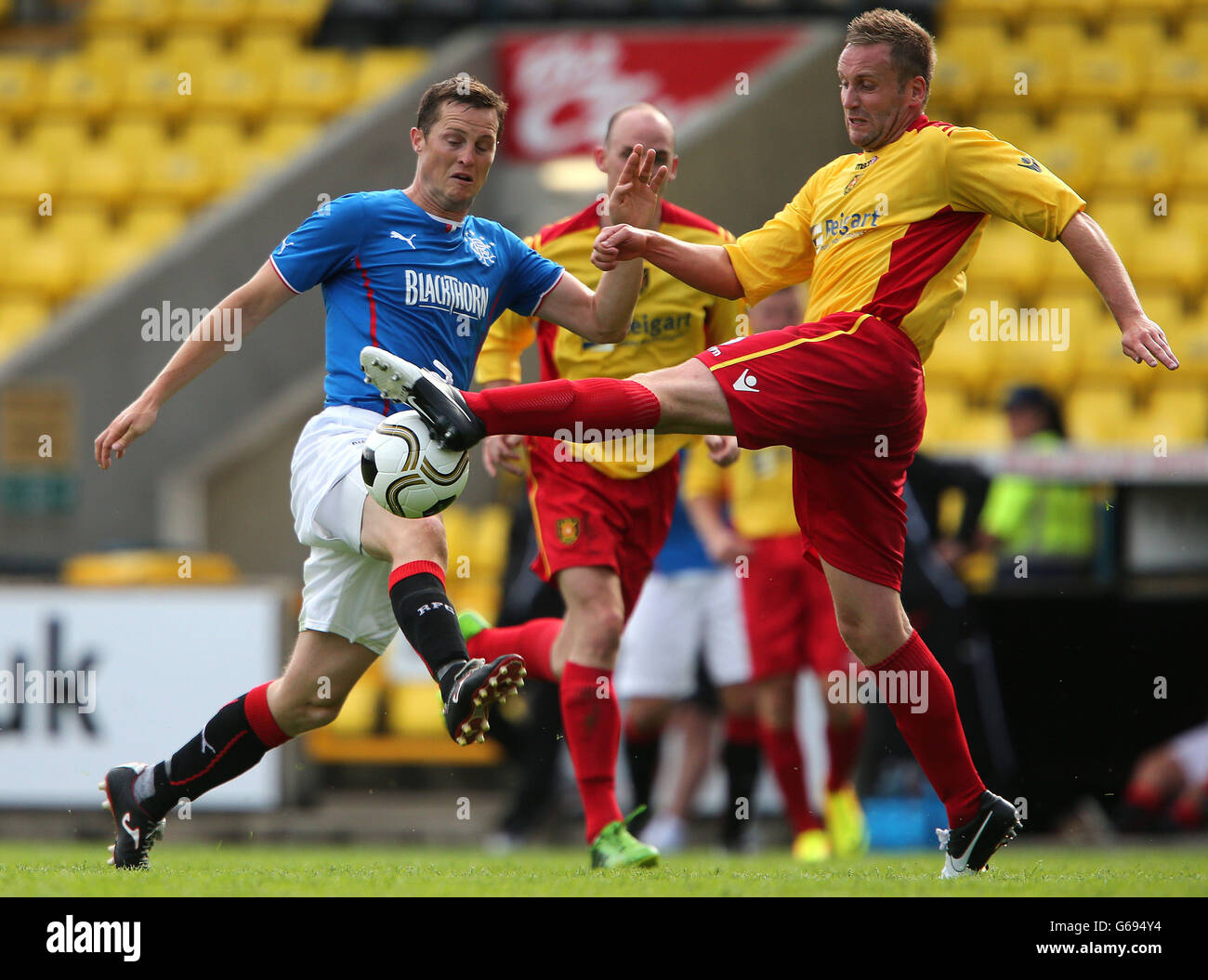 Rangers' Jon Daly and Albion Rovers' Ciaran Donnelly (right) battle for ...