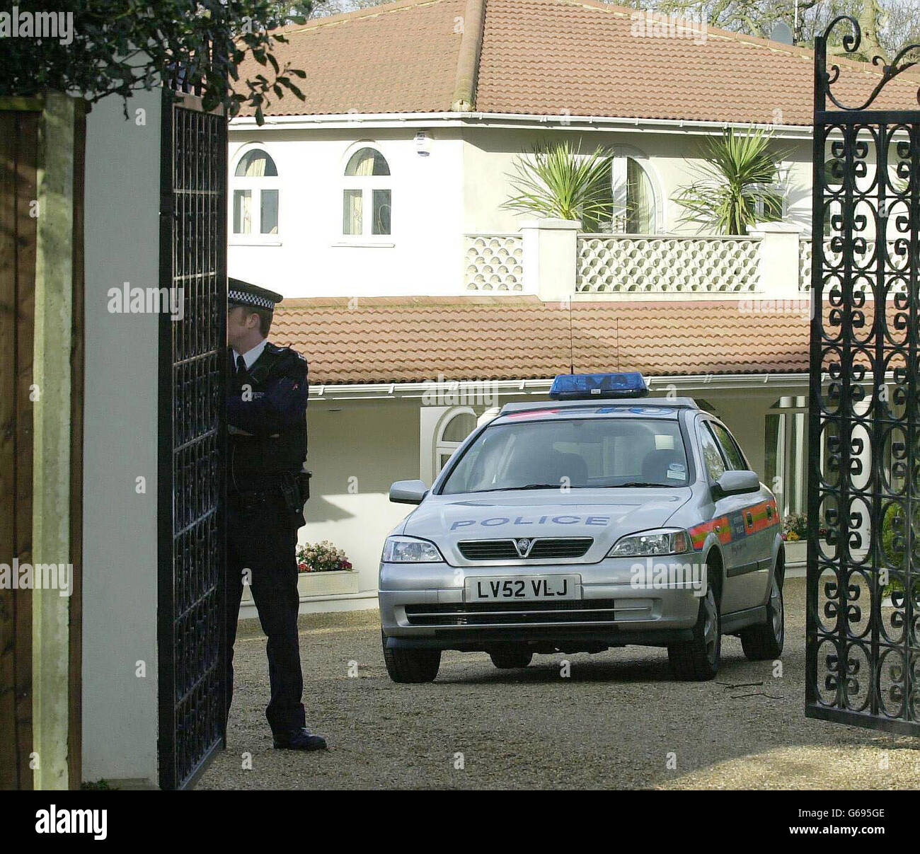 Police outside the house of Lord Levy in Mill Hill, North London ,where ...