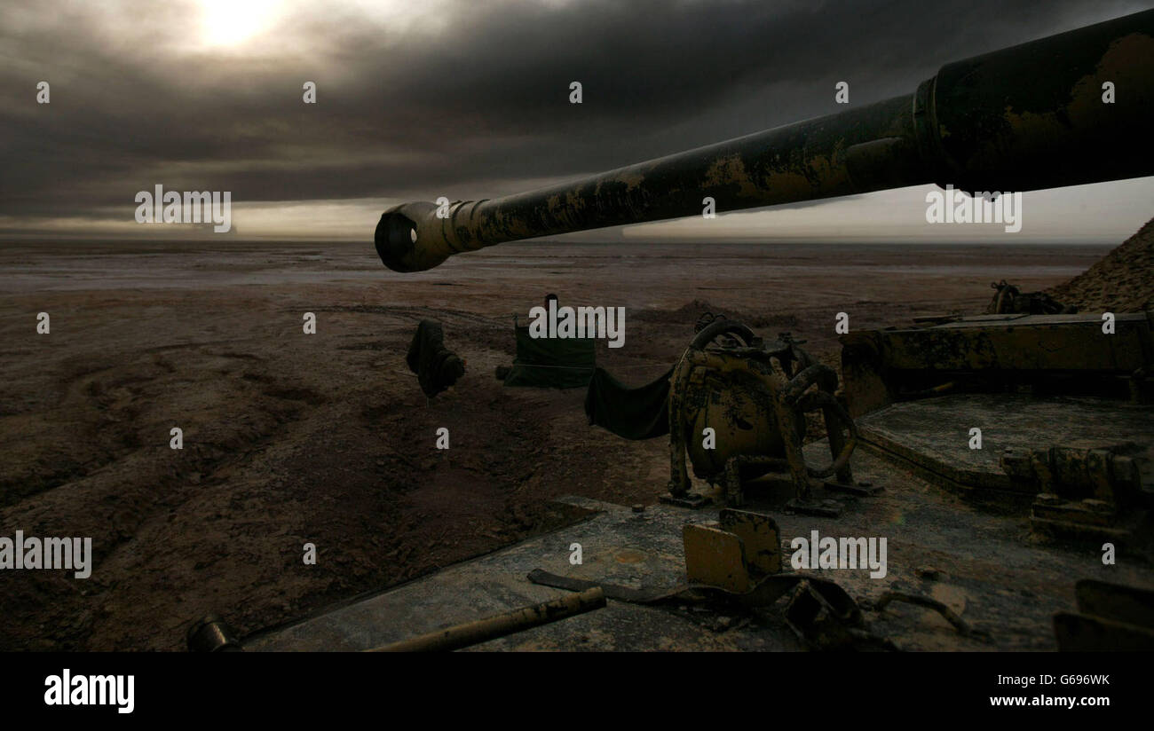 British Forces in Iraq.. A British AS90 looks out over smoke from oil ...