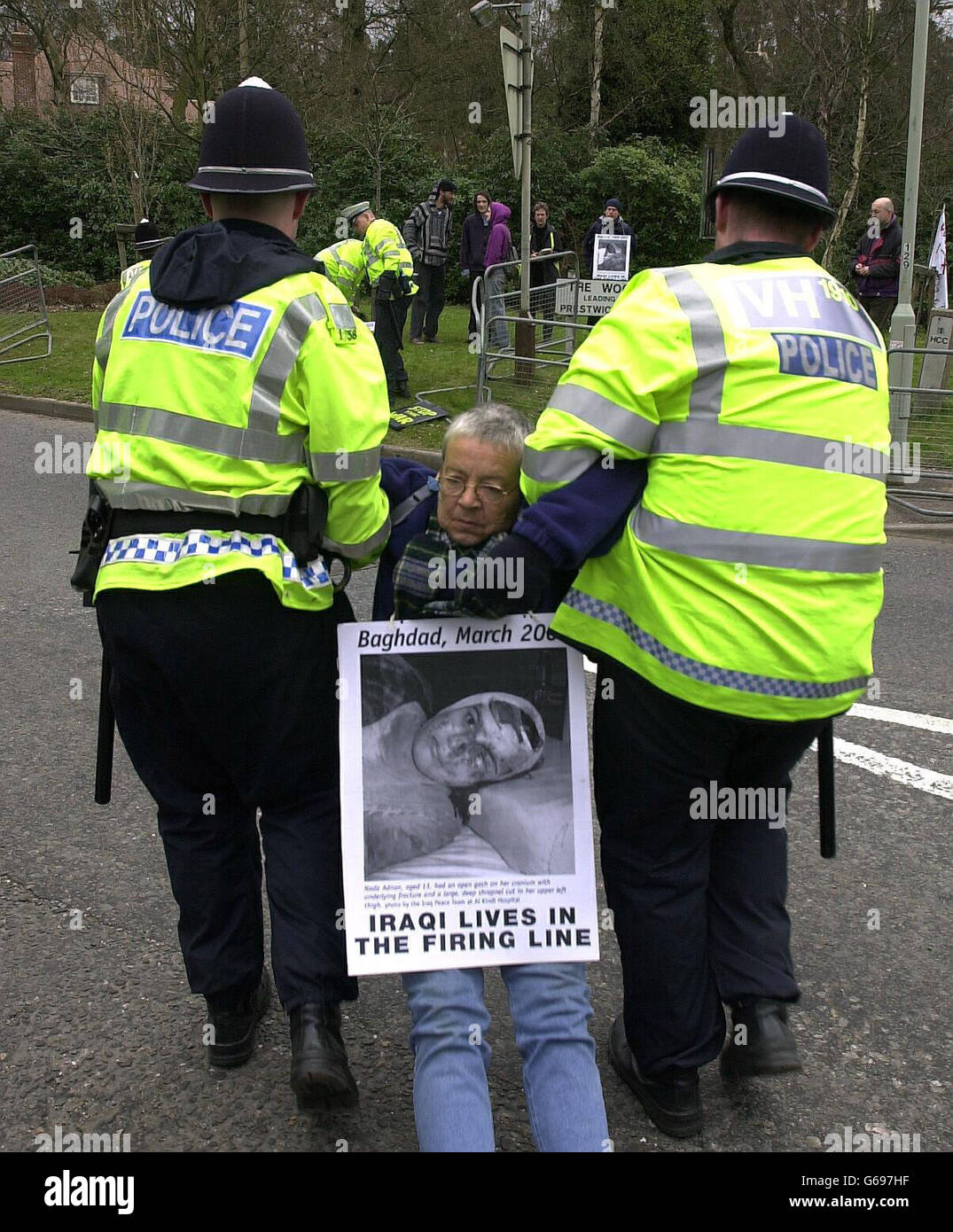 Protester being dragged police during hi-res stock photography and ...