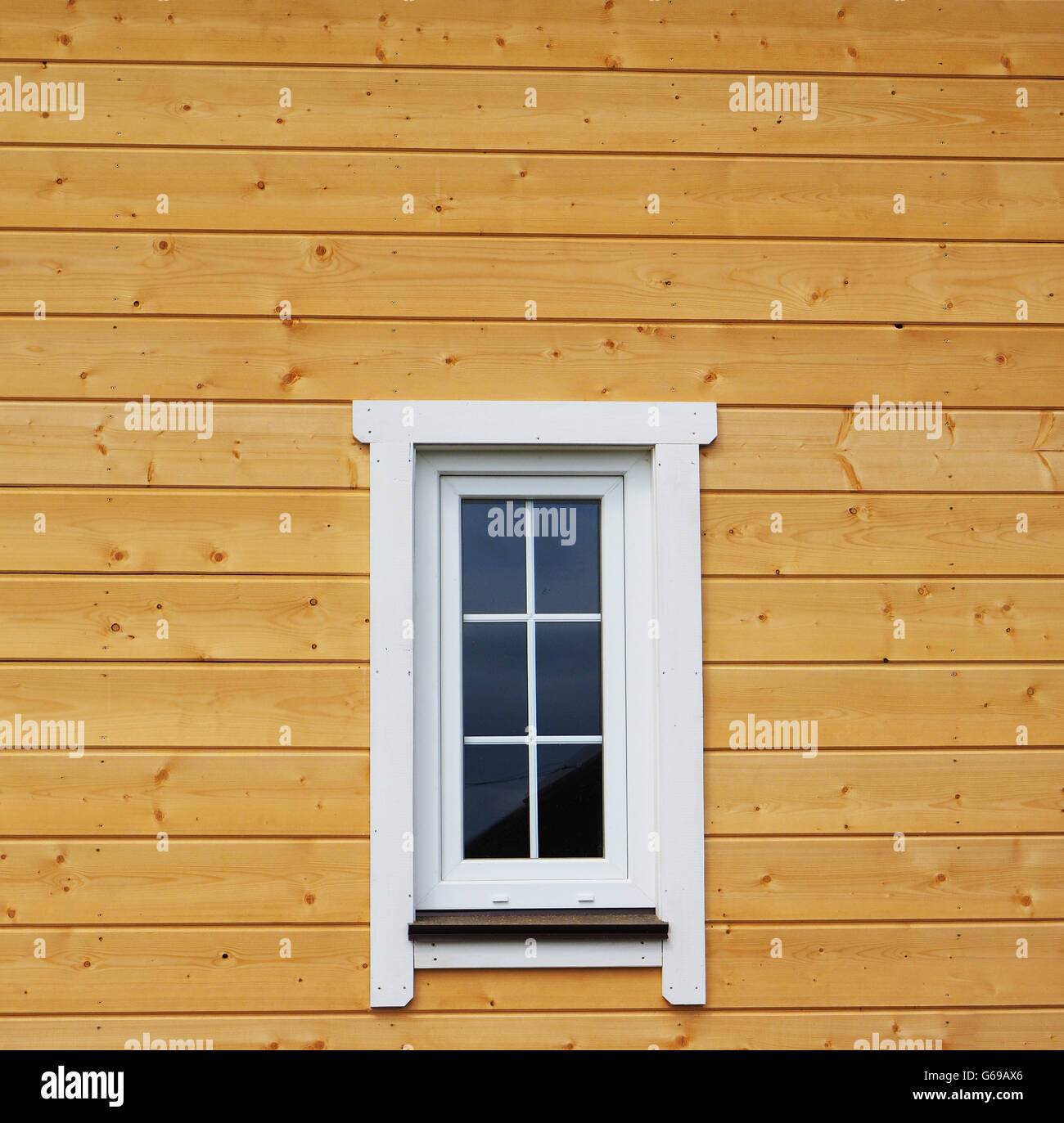window on the wooden wall Stock Photo - Alamy