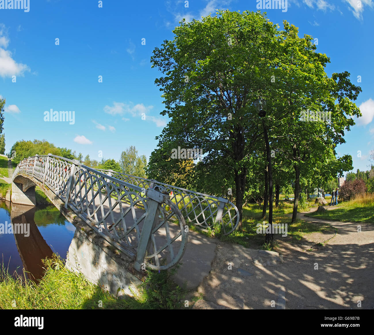 Bridge over the river in the park Stock Photo - Alamy