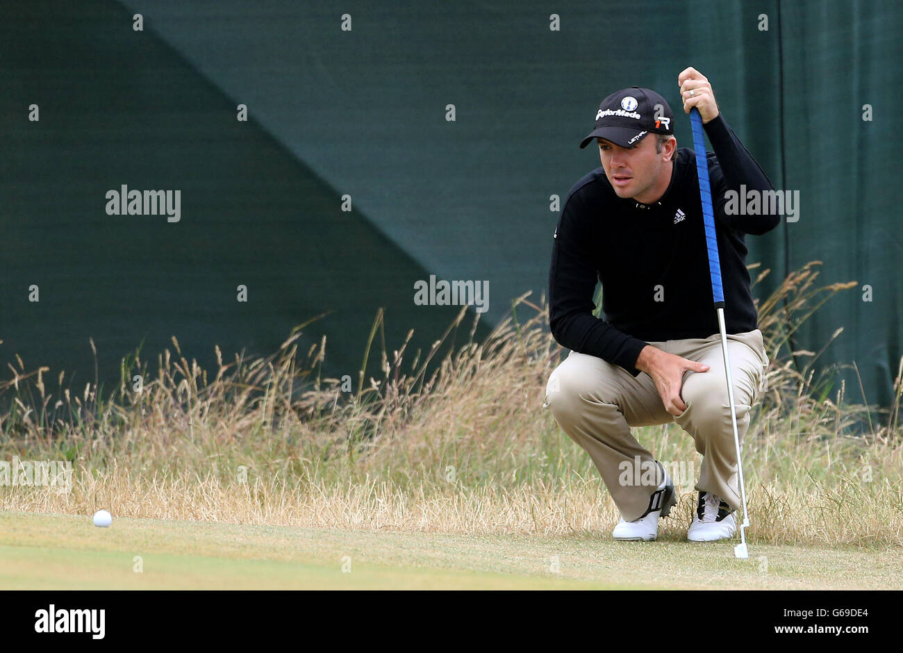 Scotland's Martin Laird putting on the first green during day four of ...