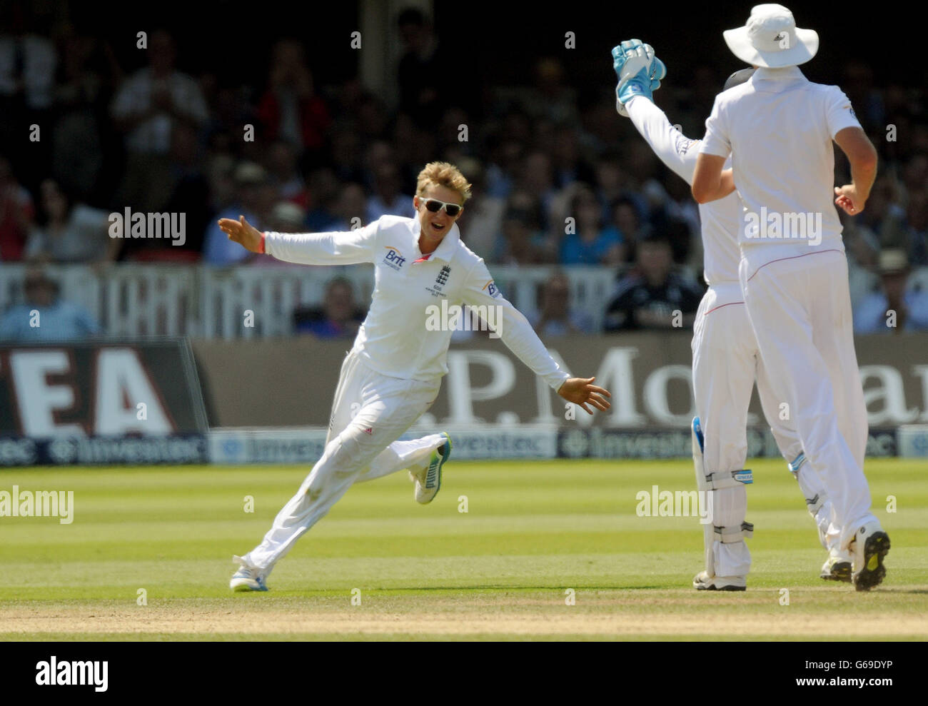 England's Joe Root celebrates taking the wicket of Australia's Michael ...