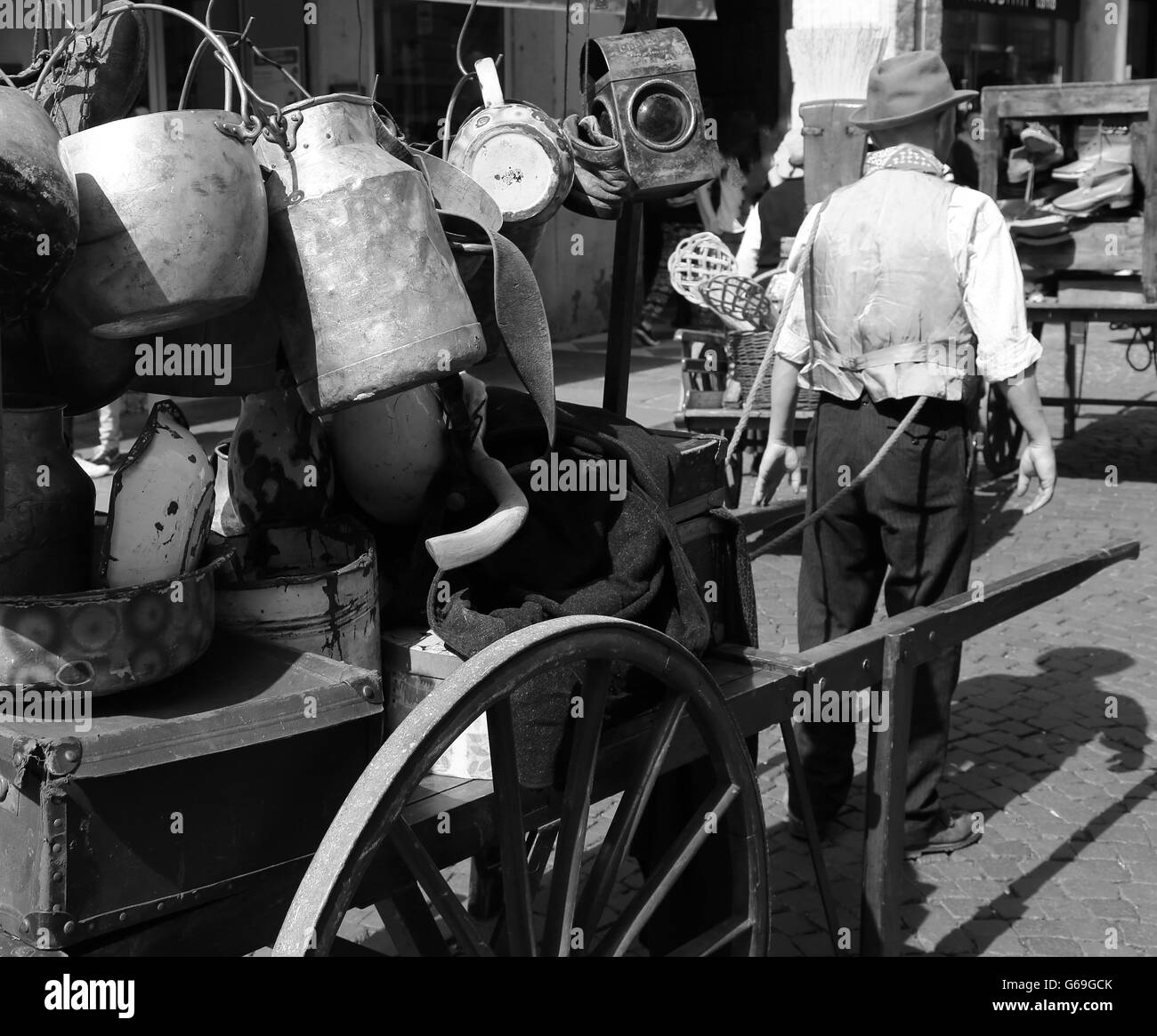 Elder street vendor with a cart full of iron and aluminium and copper ...