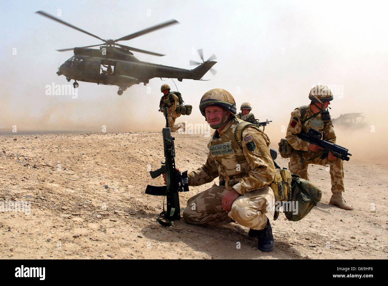 Soldiers of the 1st Battalion The Parachute Regiment prepare to carry ... Soldiers of the 1st Battalion The Parachute Regiment prepare to carry ...