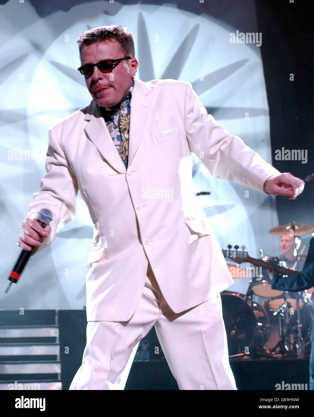 Madness lead singer Suggs performs on stage during a special concert ...