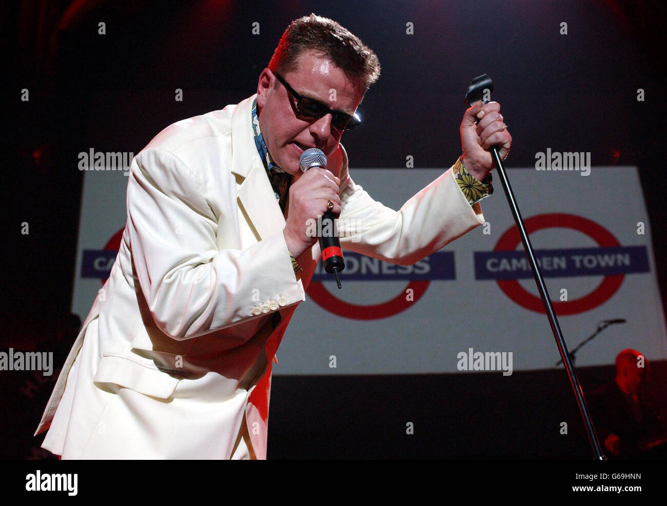Madness lead singer Suggs performs on stage during a special concert ...