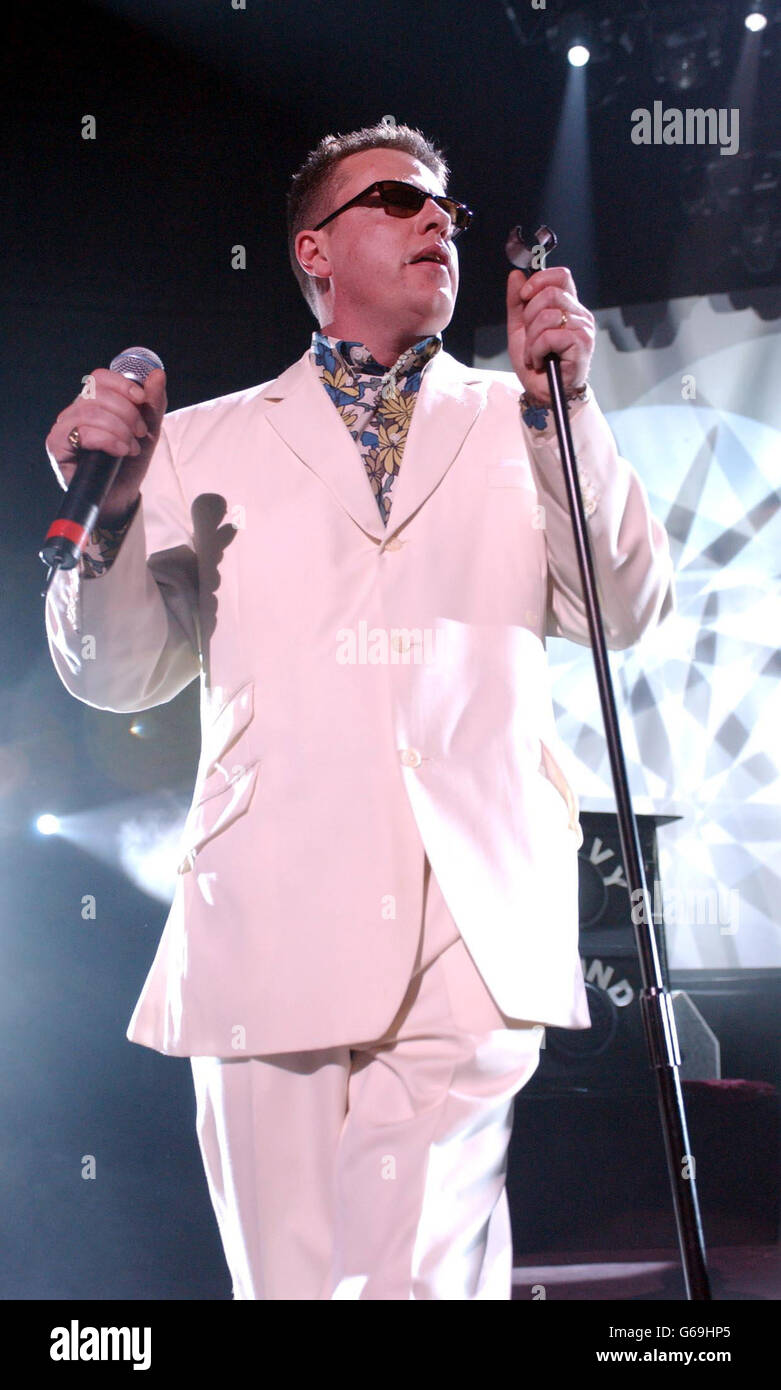 Madness lead singer Suggs performs on stage during a special concert ...