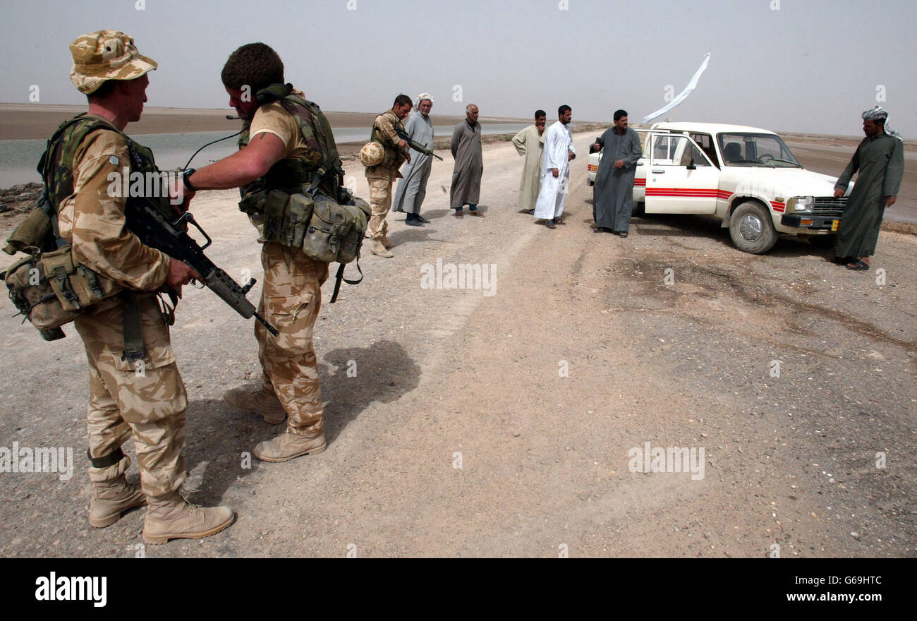 British soldiers search vehicle Stock Photo - Alamy