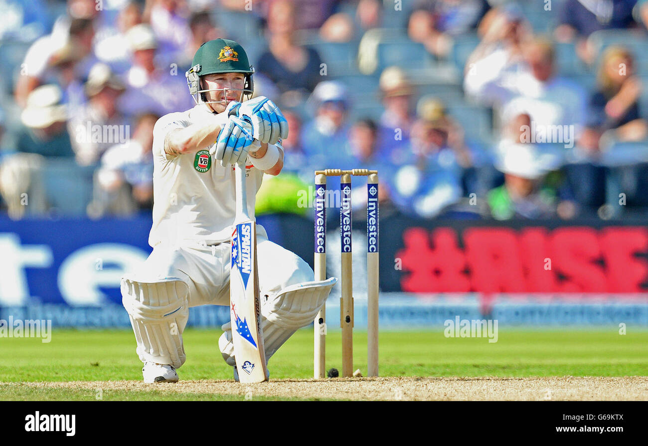 Australia's Michael Clarke stretches after a shot, during day one of ...