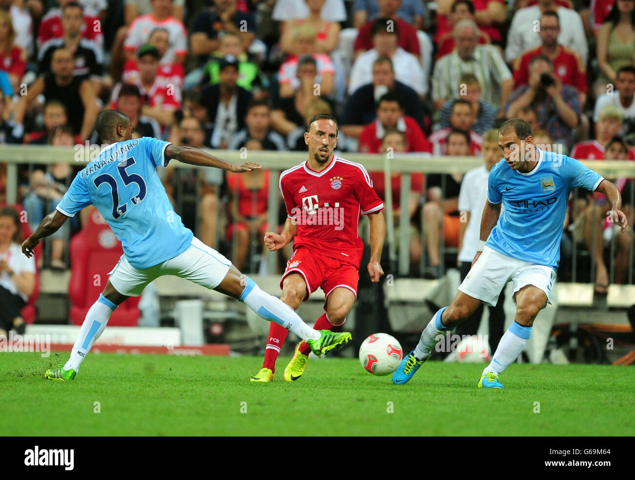 Bayern Munich's Franck Ribery gets between Manchester City's ...