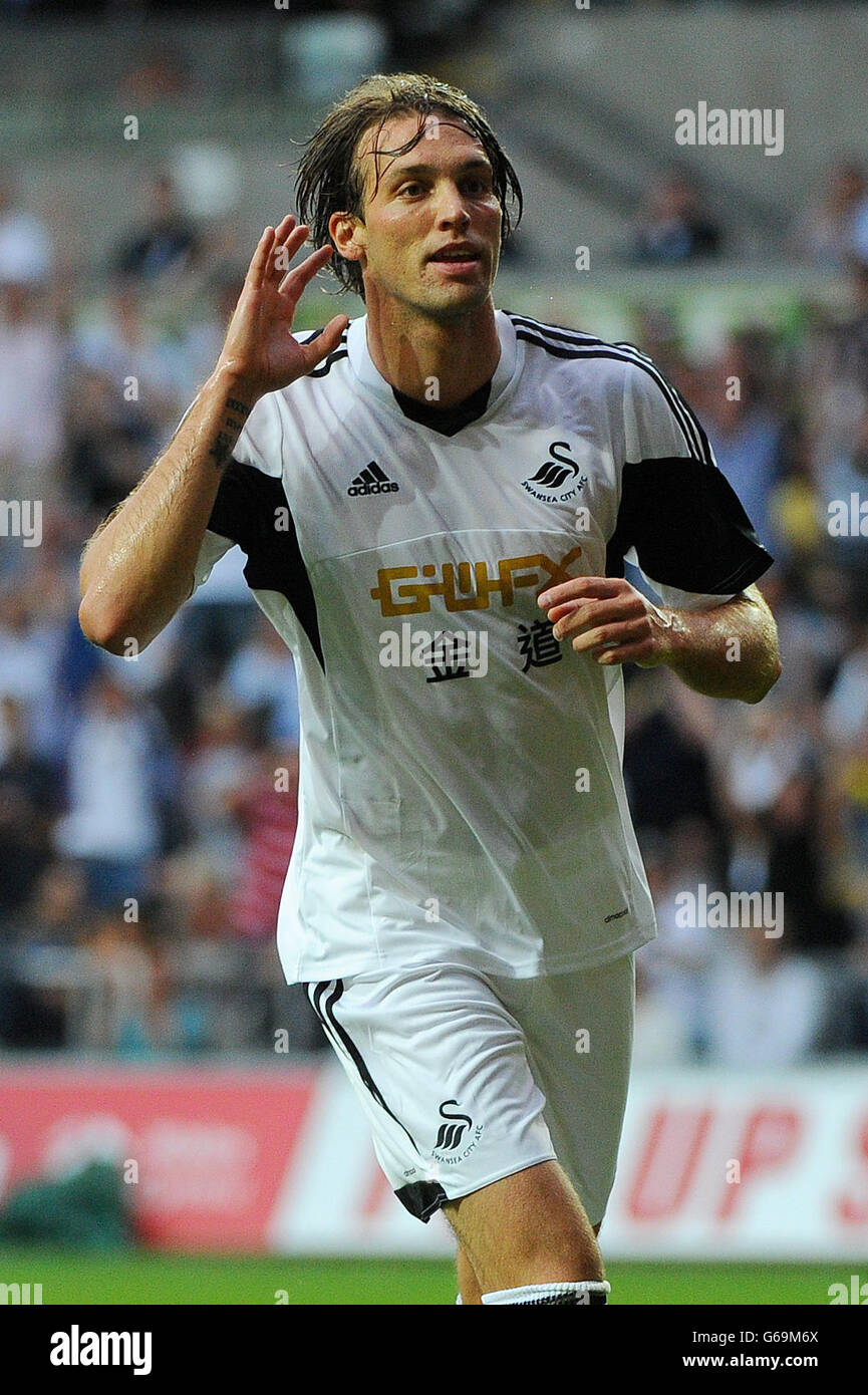 Swansea's Miguel Michu celebrates scoring during the Europa League ...