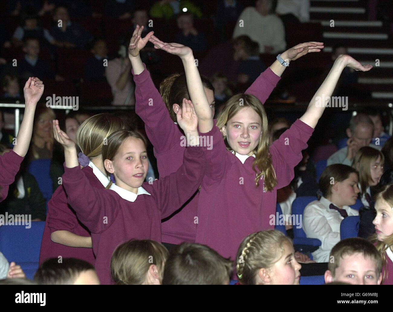 School girls support the ' Hands up for girls' education campaign at ...