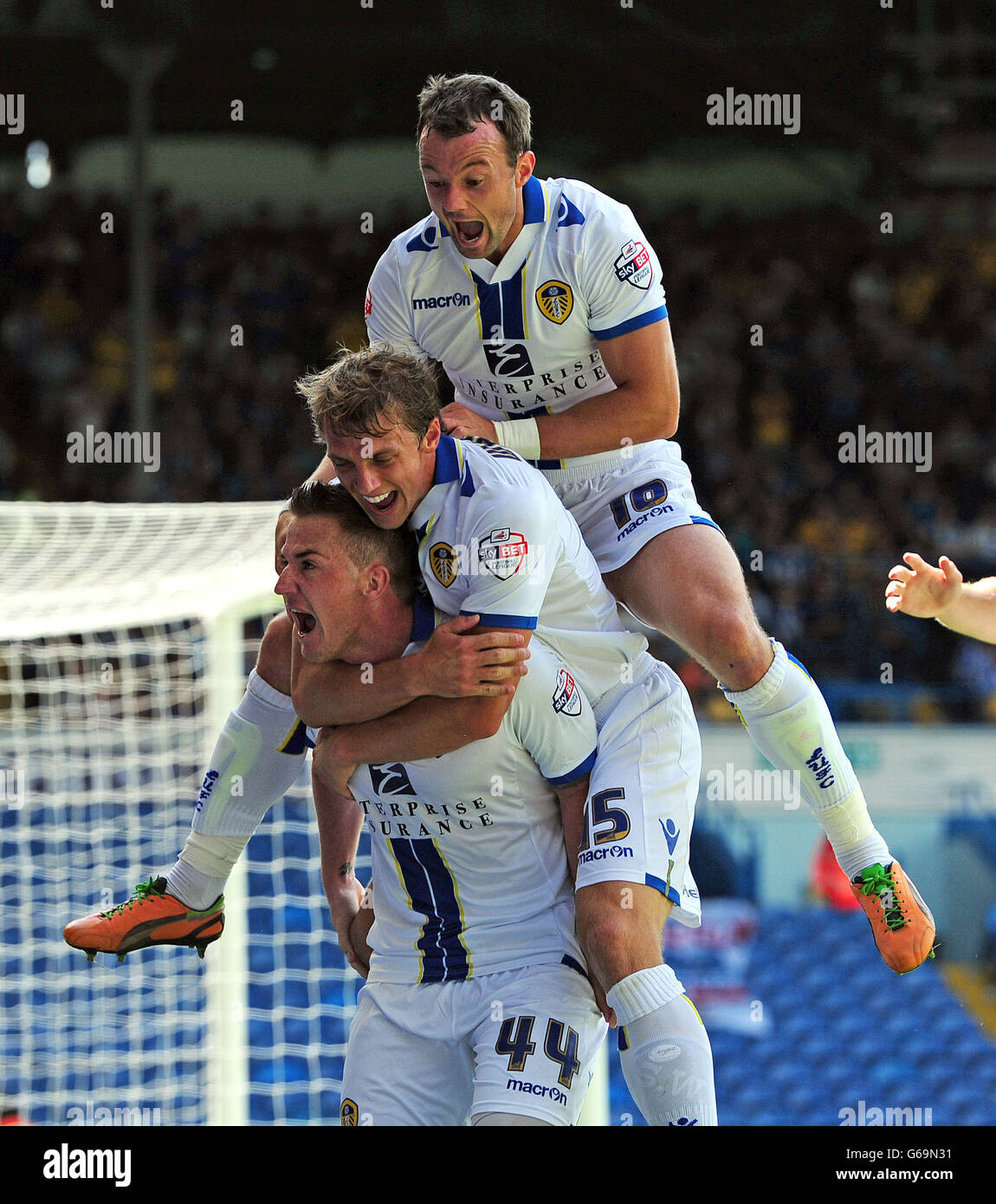 Leeds United's Ross McCormack (bottom) celebrates with Stephen Warnock ...