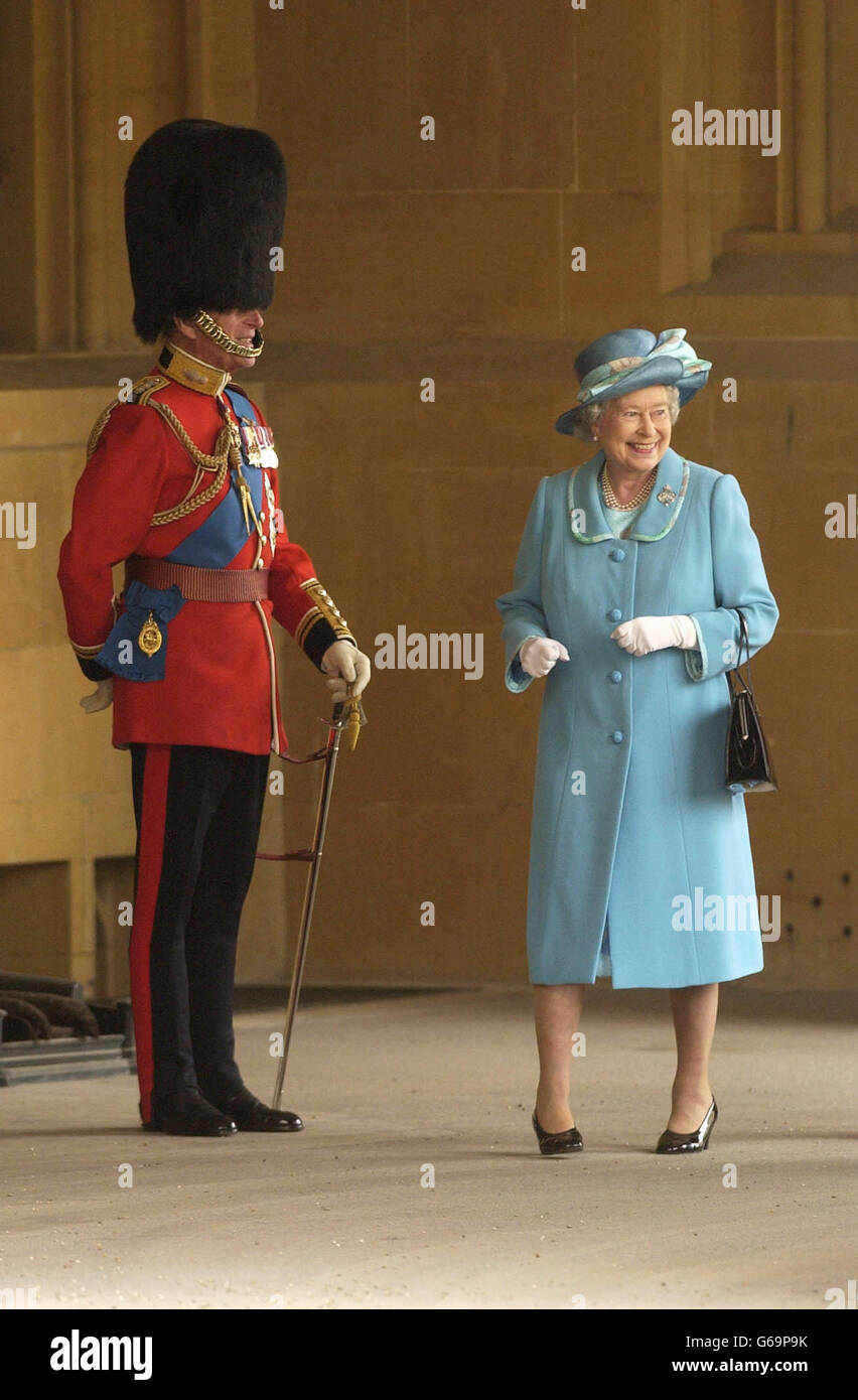 Queen Elizabeth II and Prince Philip enjoy the spectacle, as a swarm of ...