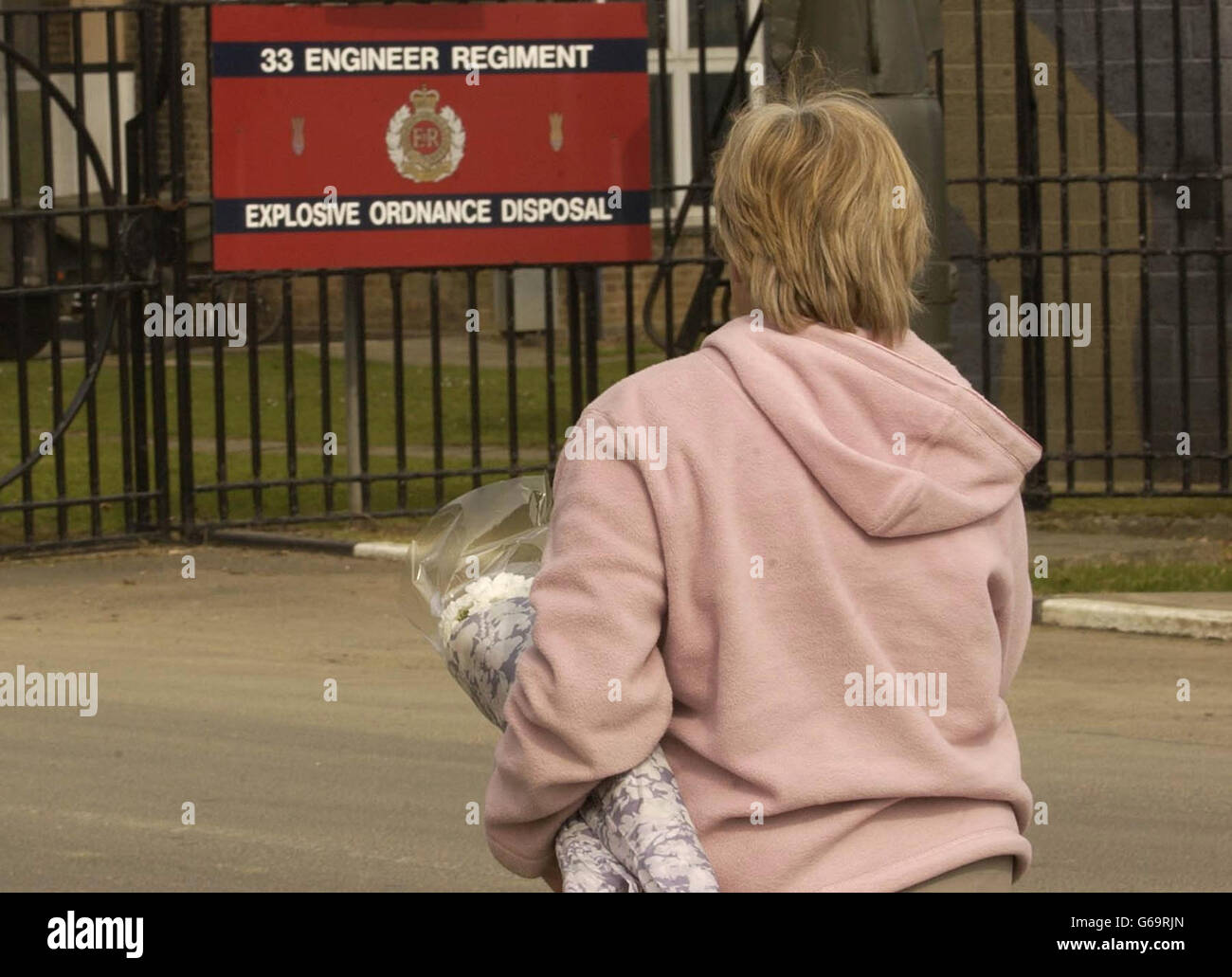 A local resident, arrives at the Regimental Barracks of the 33 Engineer ...