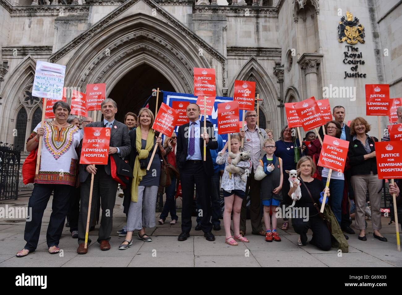 Demonstrators outside the High Court in London celebrate as Mr Justice ...