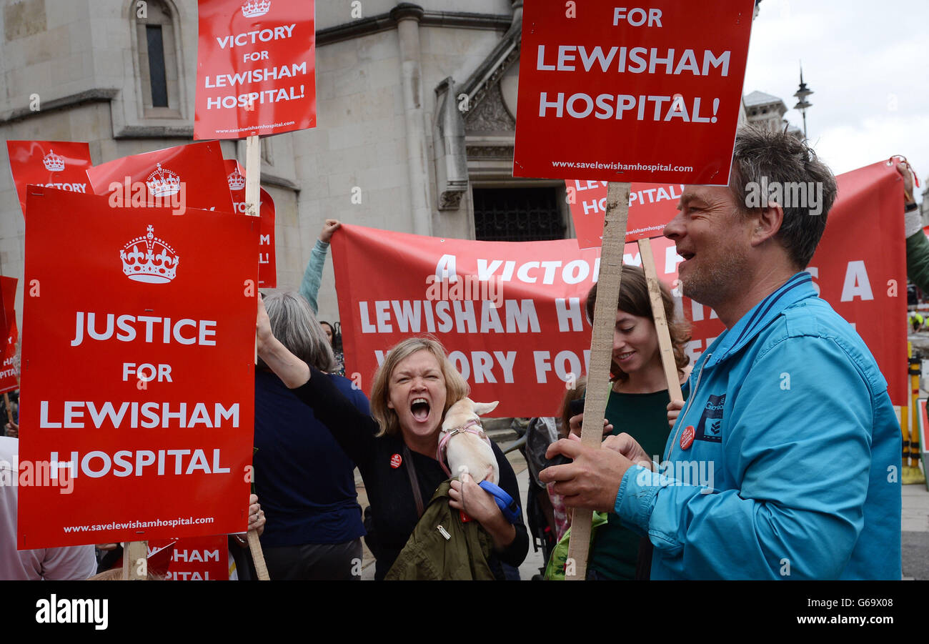 Demonstrators outside the High Court in London celebrate as Mr Justice ...