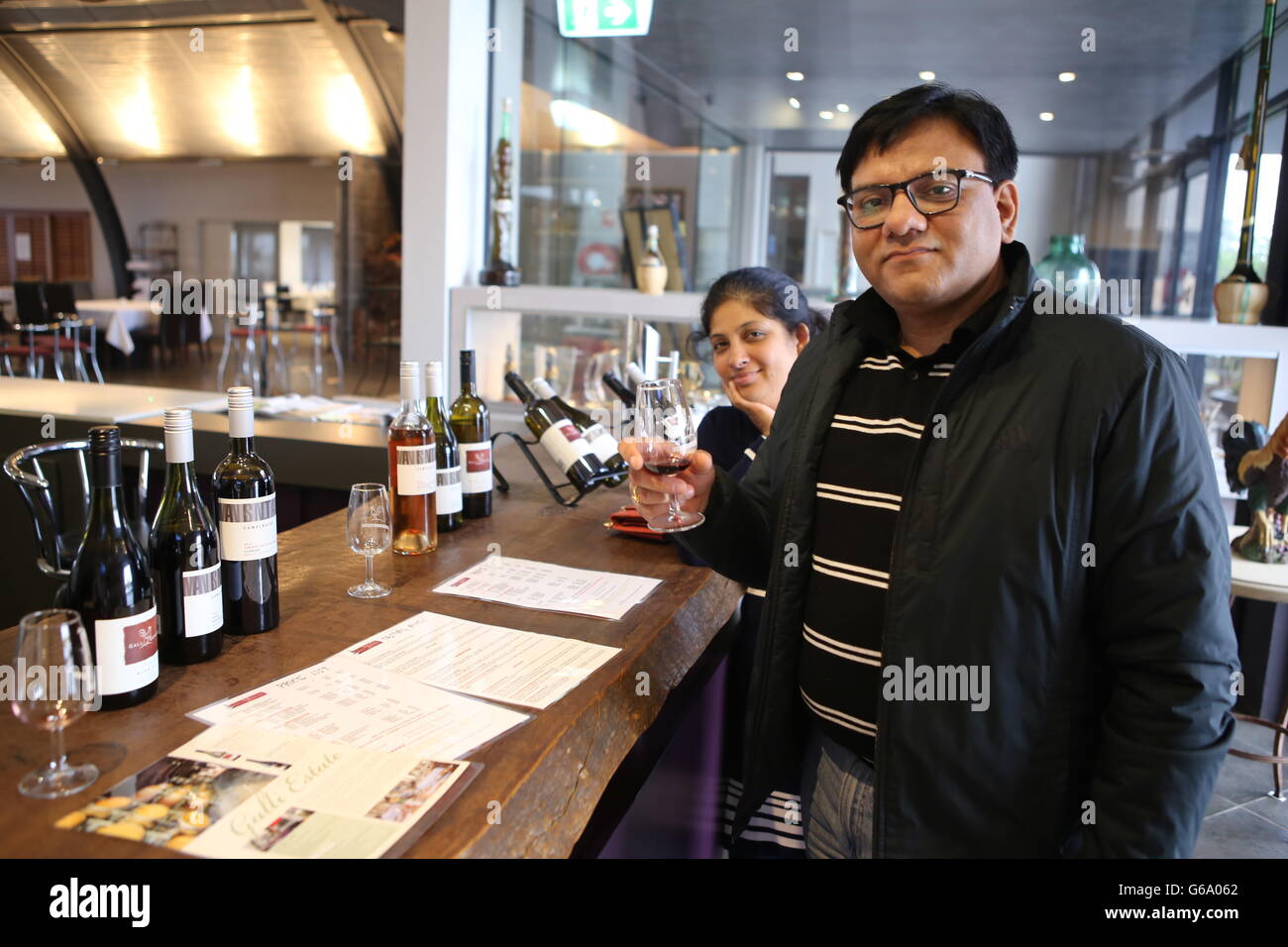 Indian couple in a bar happy mood Model Release Stock Photo - Alamy