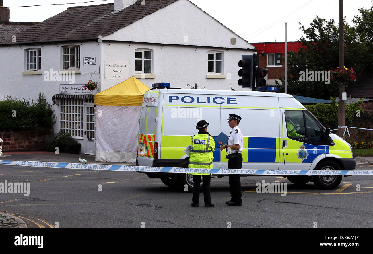 Merseyside police officers seal off area in woolton village hi-res ...
