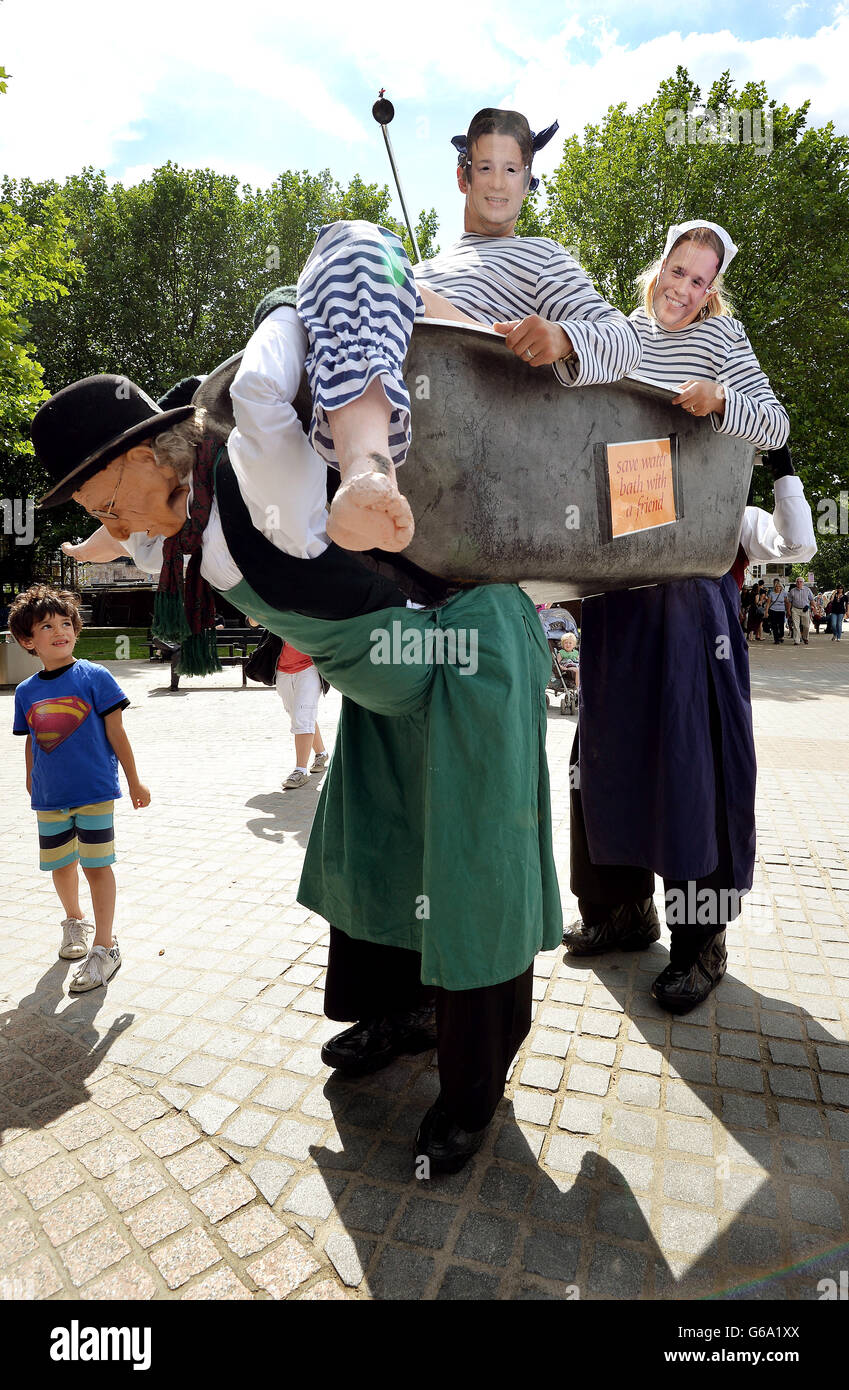 People wearing masks of Jamie Oliver the TV celebrity Chef and Olly ...