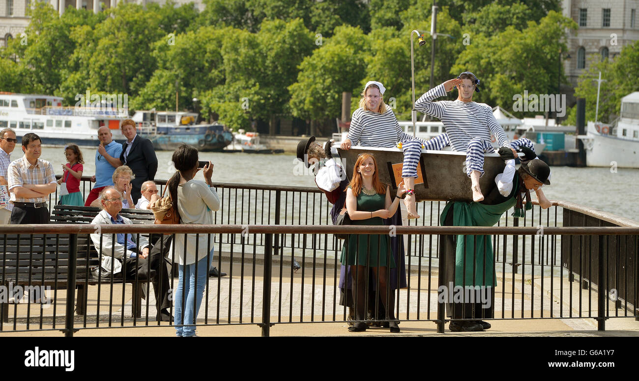People wearing masks of Jamie Oliver the TV celebrity Chef and Olly ...