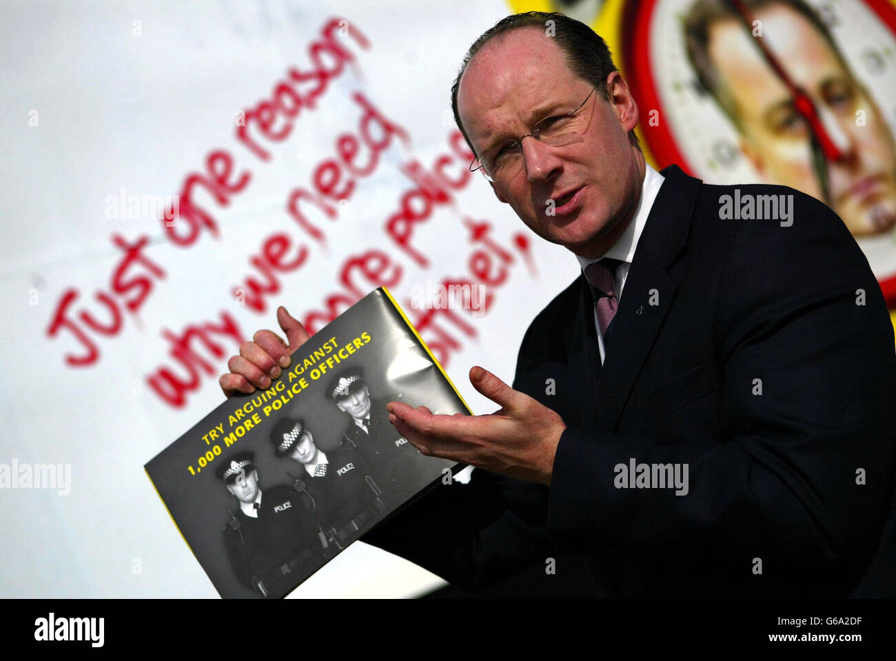 SNP Leader John Swinney unveils a new campaign poster near the Braehead ...