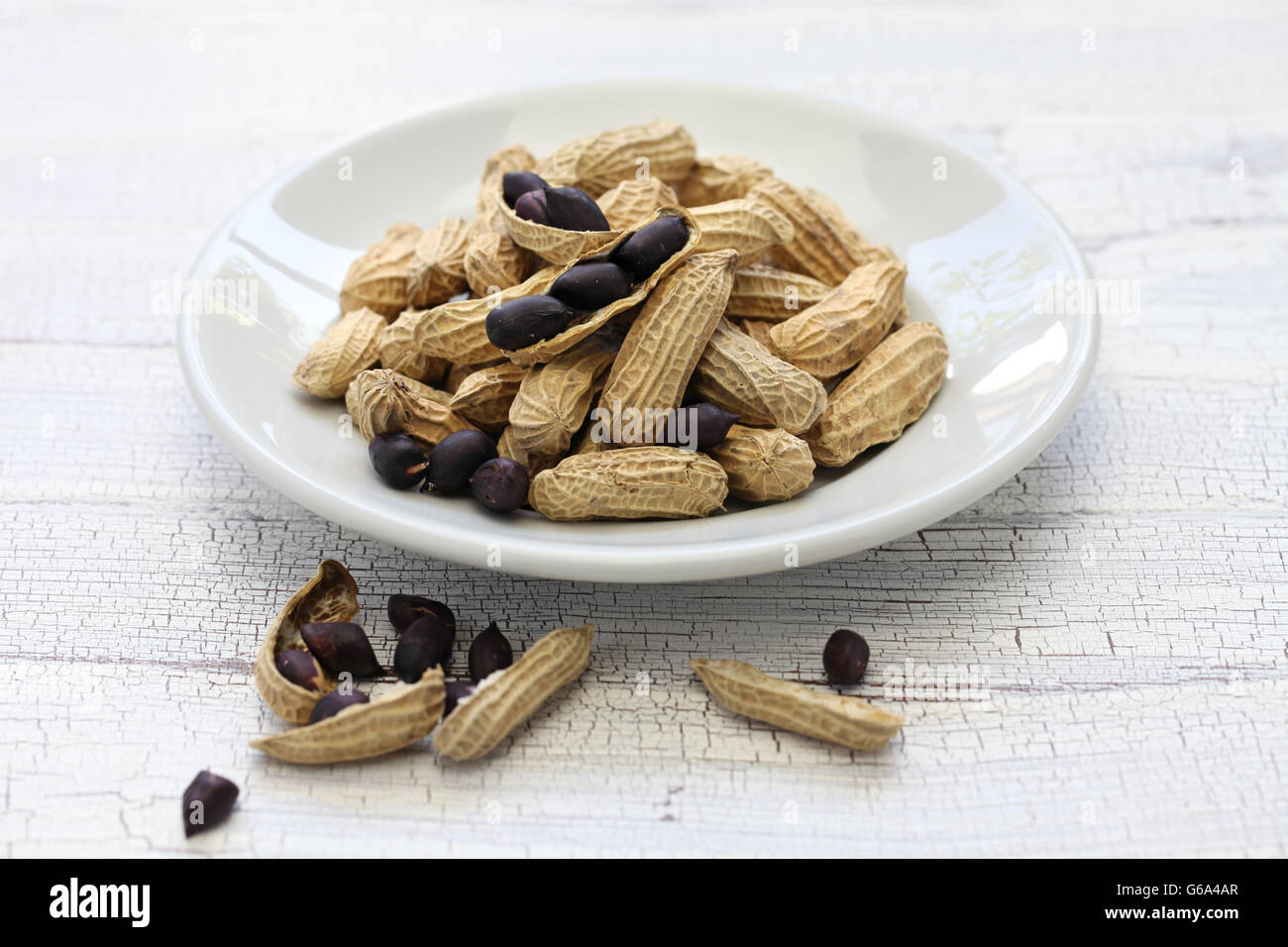 Black peanuts hi-res stock photography and images - Alamy
