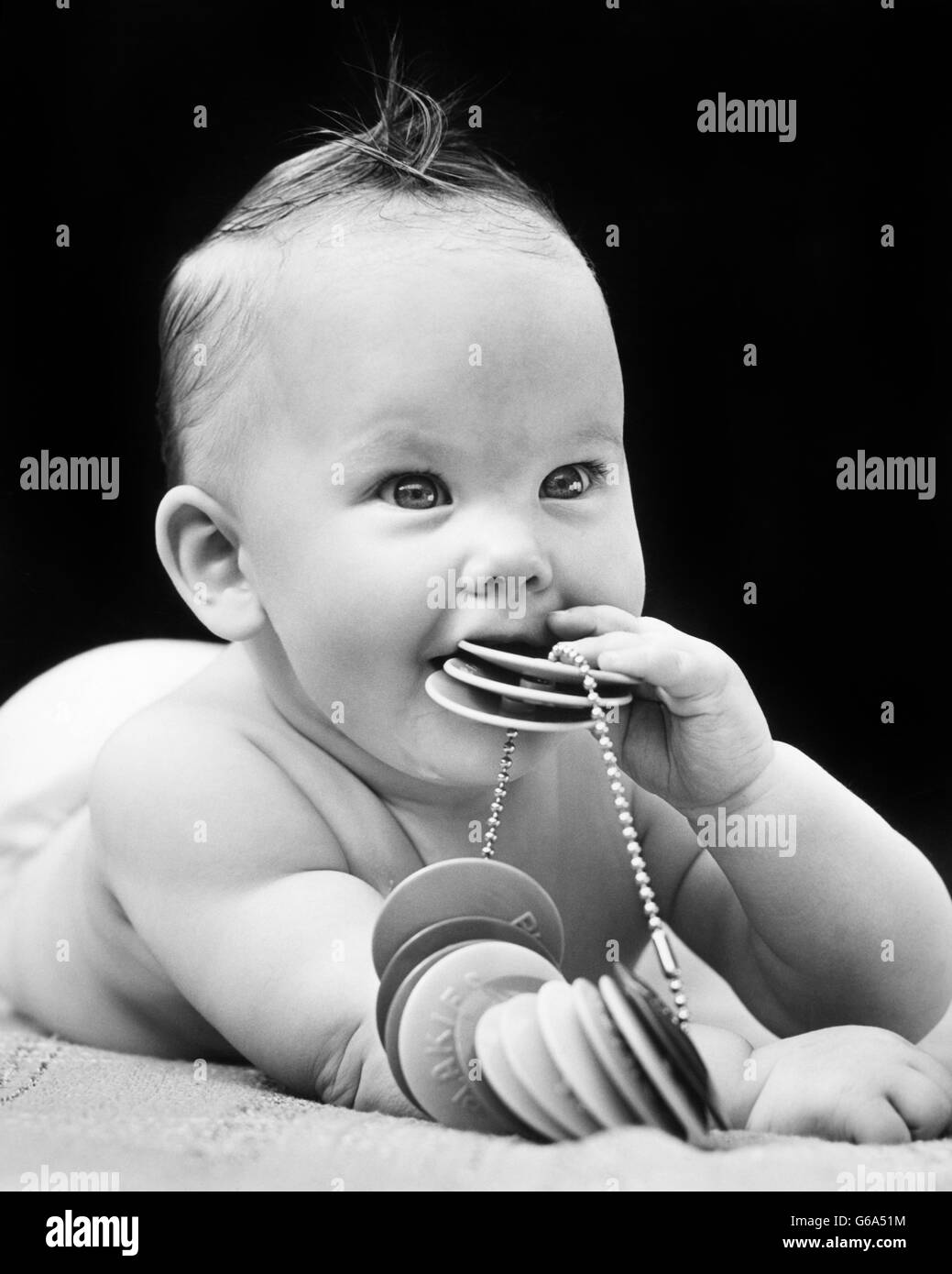 0 6 baby chewing hi-res stock photography and images - Alamy