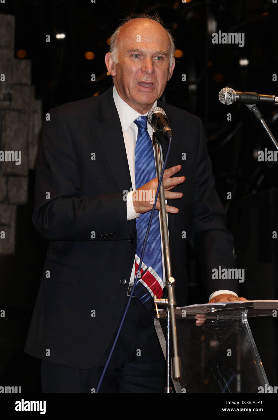Business Secretary Vince Cable speaking on stage during the British ...