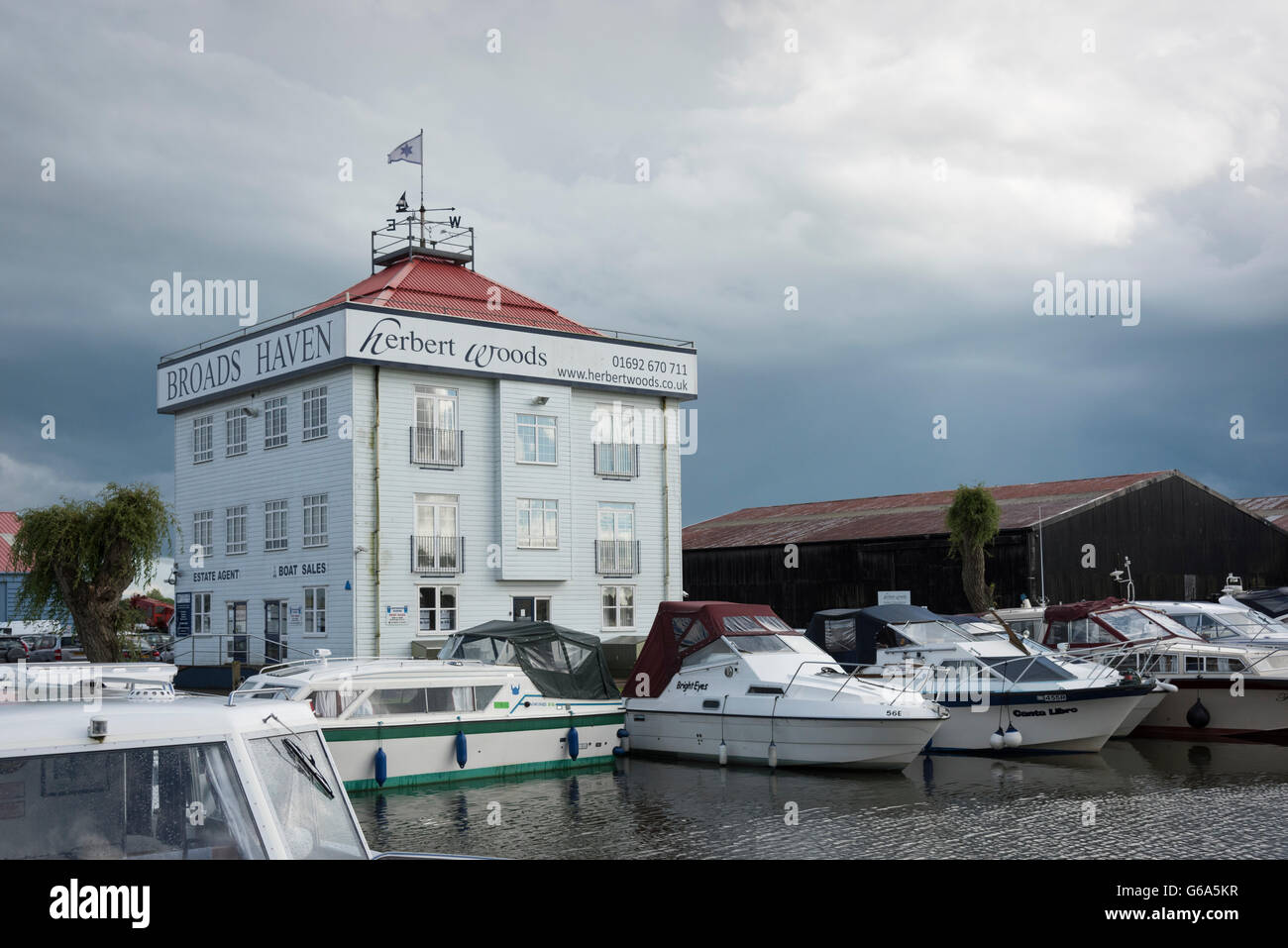 A building and offices at the Broads Haven boatyard and marina for ...