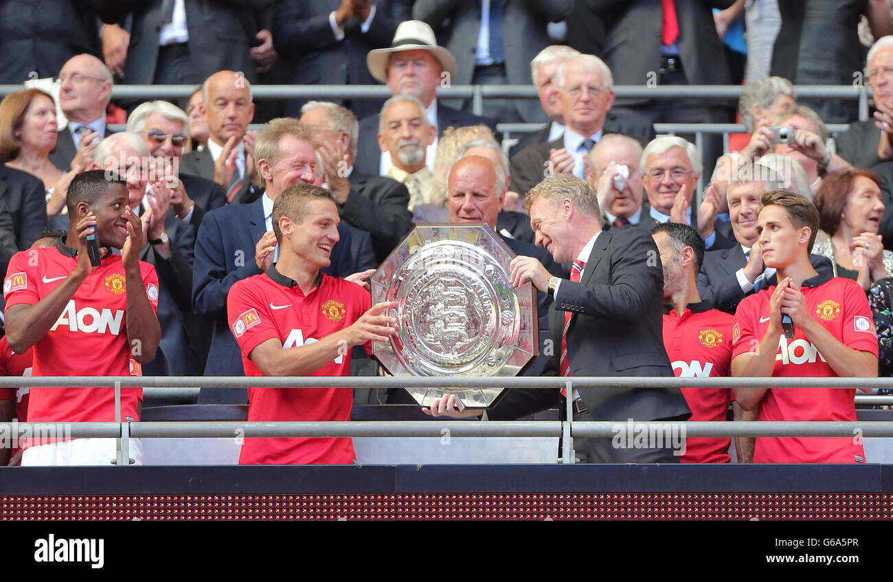 Manchester united captain nemanja vidic and manager david moyes hold ...