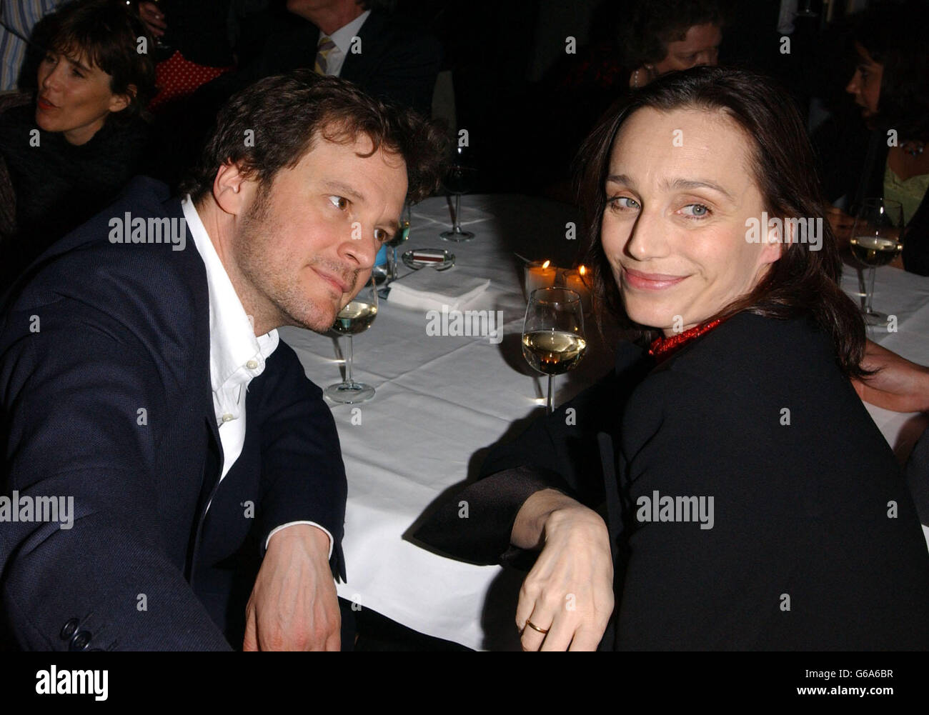 Actor Colin Firth chats to Kristin Scott Thomas during the party after ...