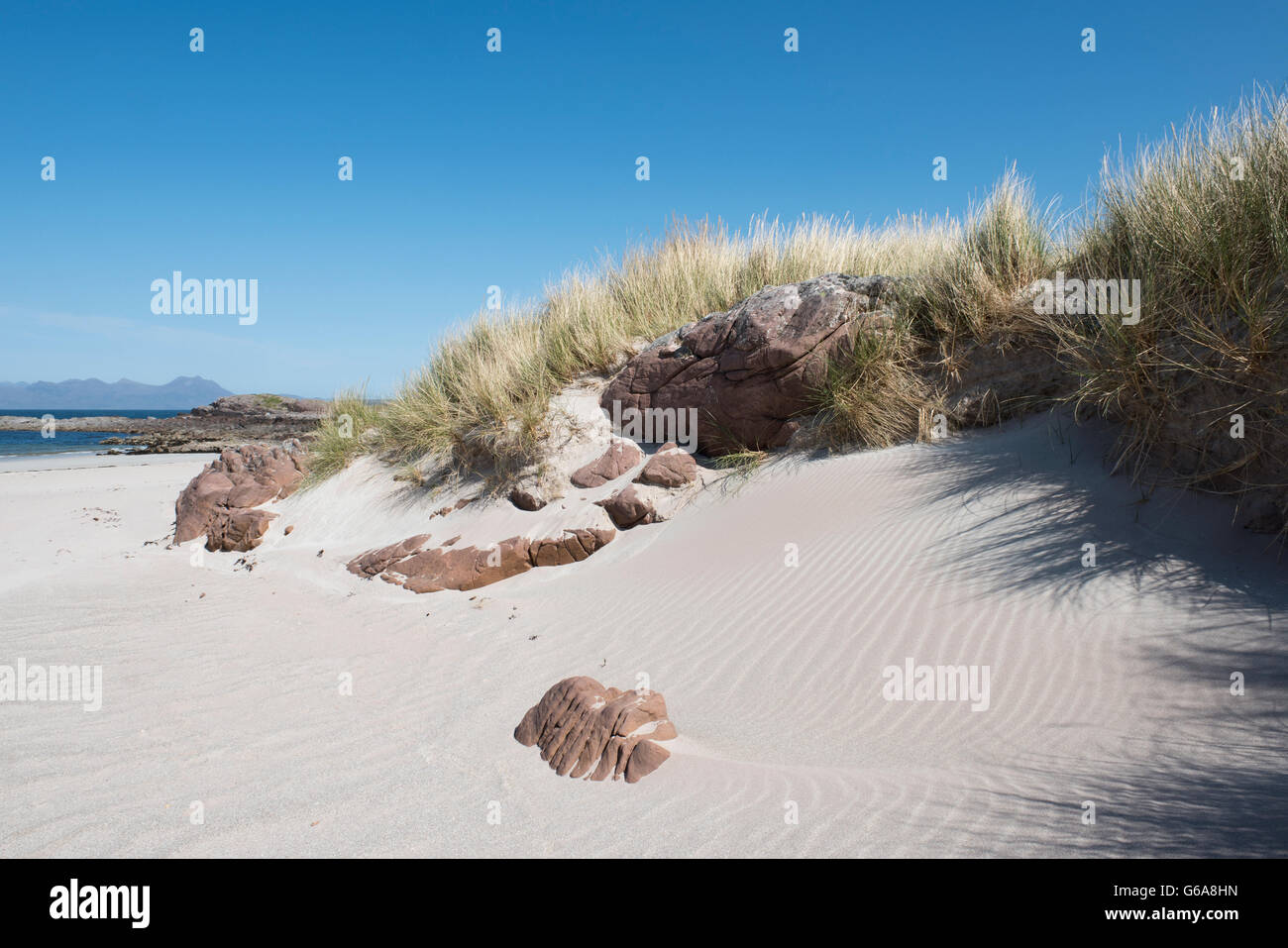 Sand dunes, torridon sandstone, marram grass beach scene at Mellon ...