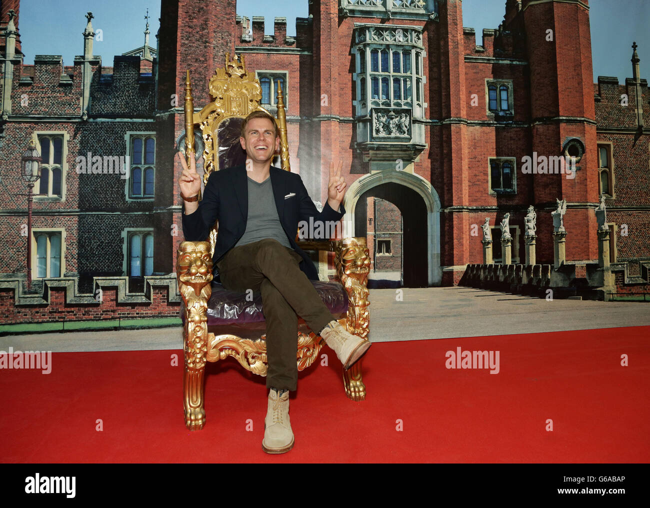 ITV's Daybreak presenter Matt Barbet sits in a throne chair against a ...