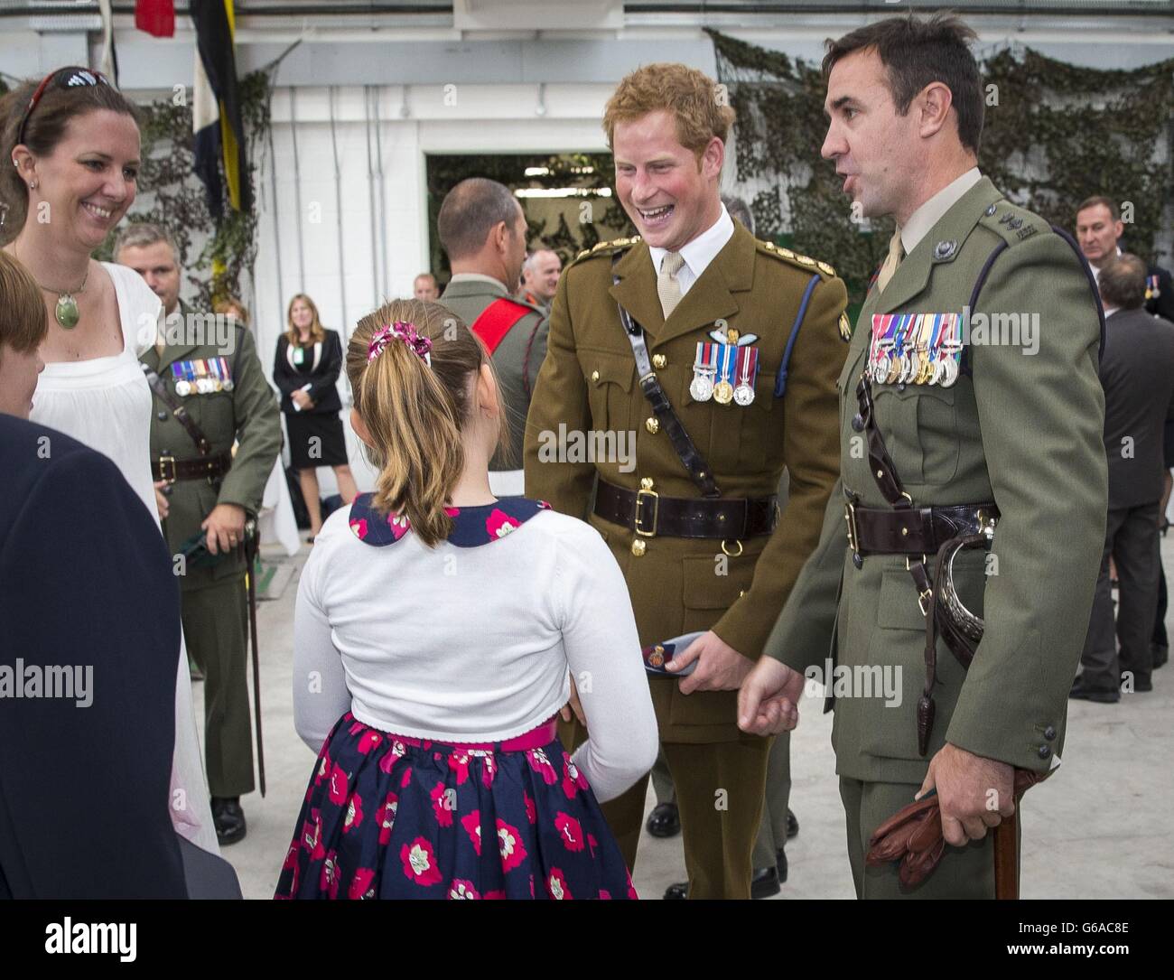 Prince Harry meets Lt Col Tristan Harris and Tasha Reilly's family ...